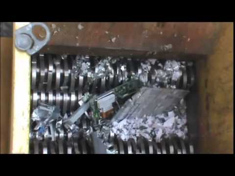 WEEE demonstration - UNTHA RS60 four shaft shredder processes hard drives & IT equipment