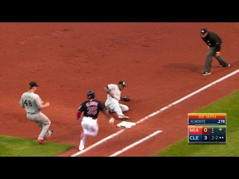 MIA@CLE: Scruggs makes a tough play at first