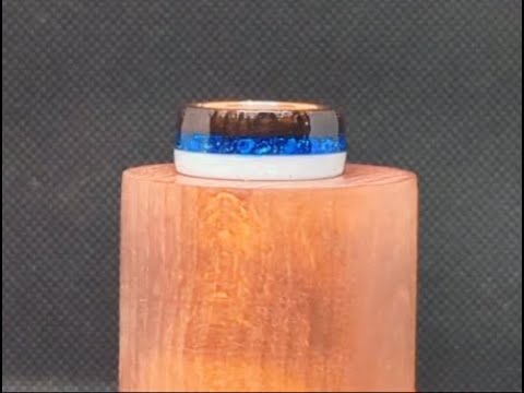 Process of crafting ring made from wenge wood and white artificial stone