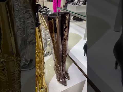 Nancy In Multiple Pairs Of Shiny Boots
