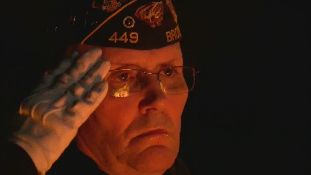 Boy scouts retire flags at Veterans Day ceremony