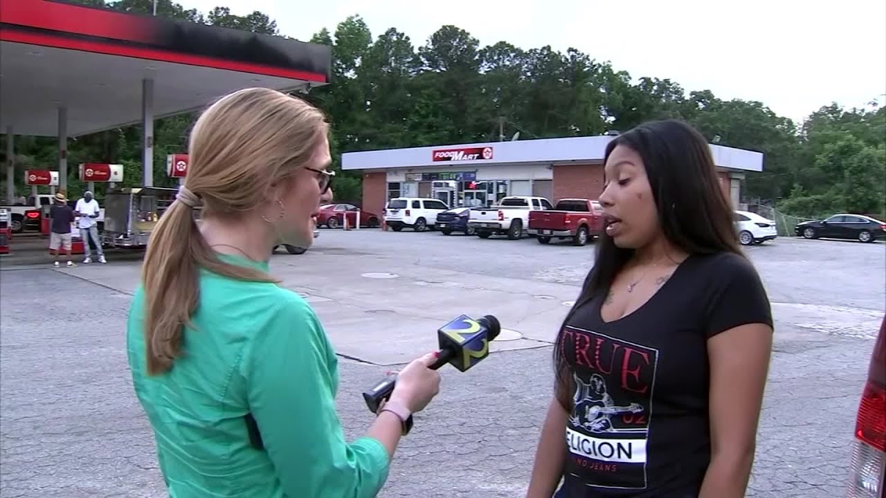 Woman jumps through car window to stop thief