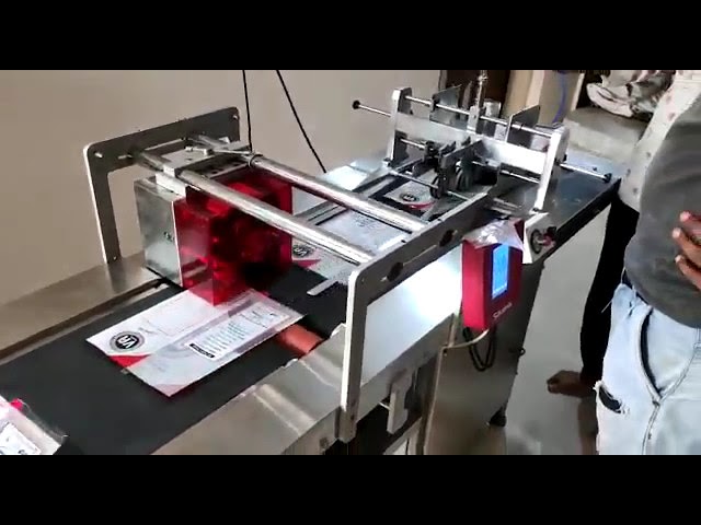 Pouch Feeding Conveyor Machine - Tto Printer Conveyor Manufacturer ...