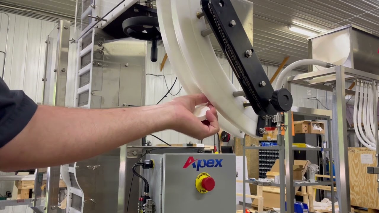 Apex Filling Systems- Cap Sorting Elevator Setup