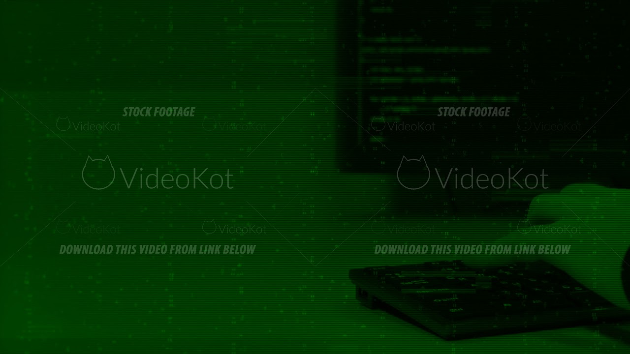 Hacker programmer hands close up typing code on keyboard in green terminal