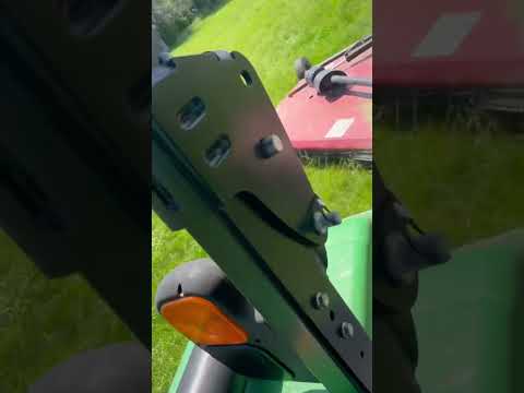 John Deere 5075e with 15 foot bush hog