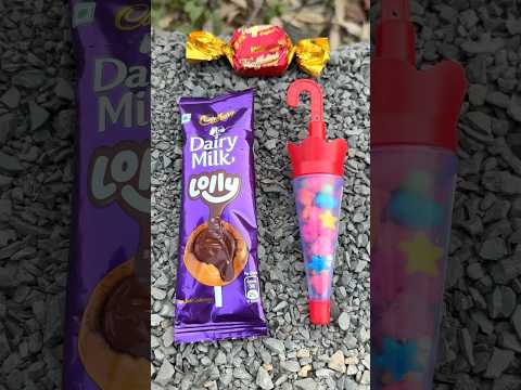 Dairy milk lollipop & candy & ambrella gems #shorts #dairymilk #lollipop