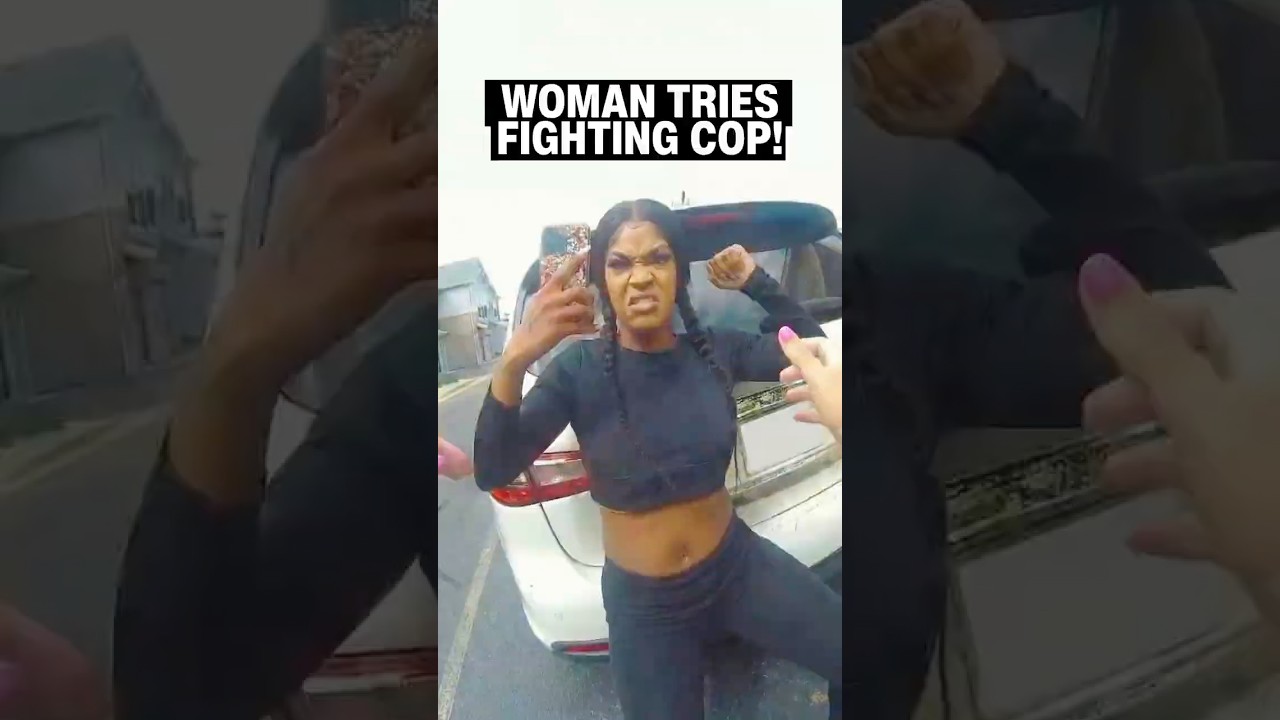 Woman Tries Fighting Cop!