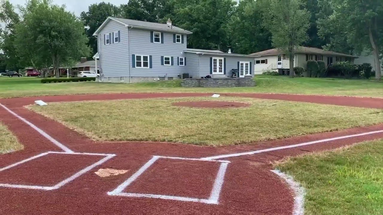 Man builds baseball field in his backyard