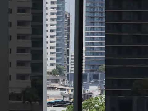 Water cascades down high-rise after powerful 7.7 magnitude earthquake