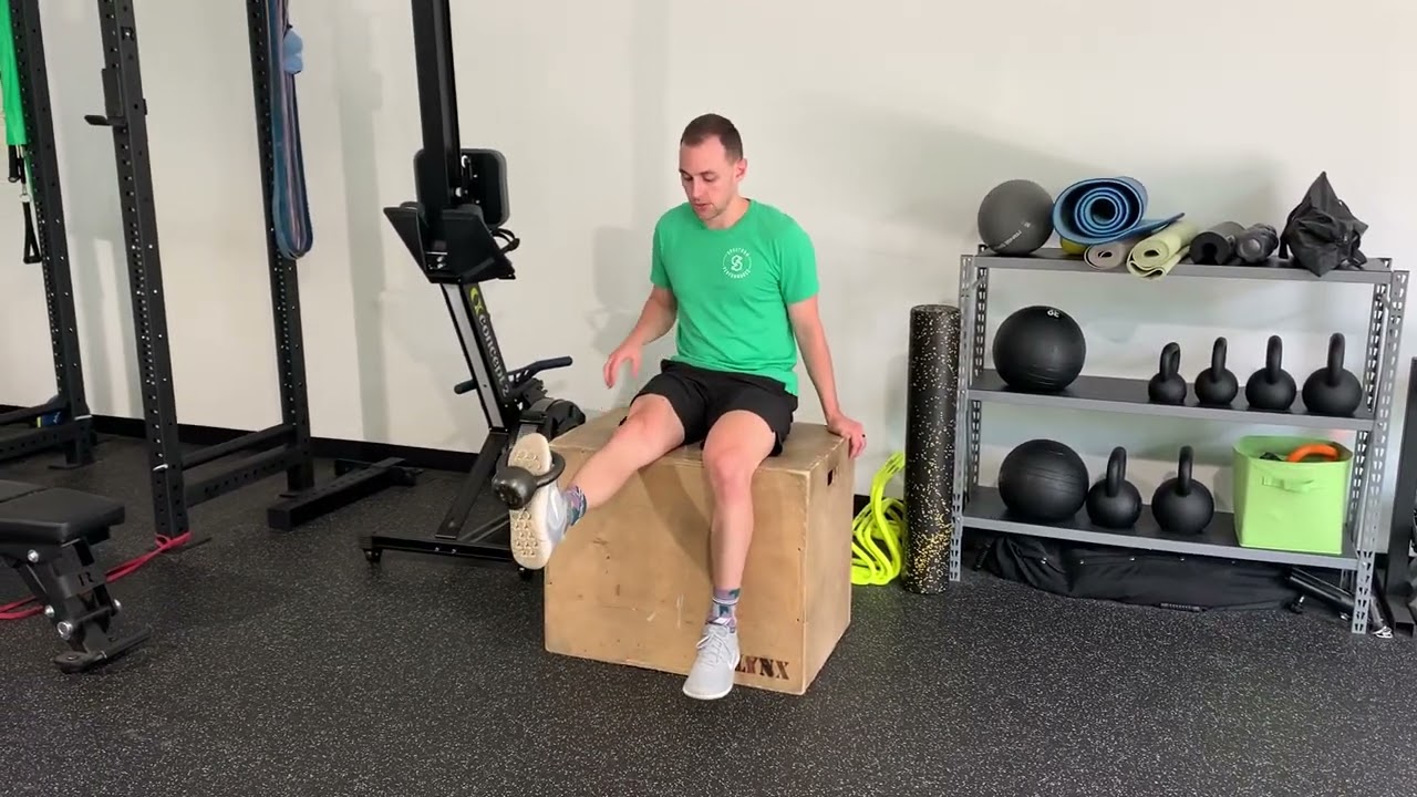 Eccentric knee extension with KB
