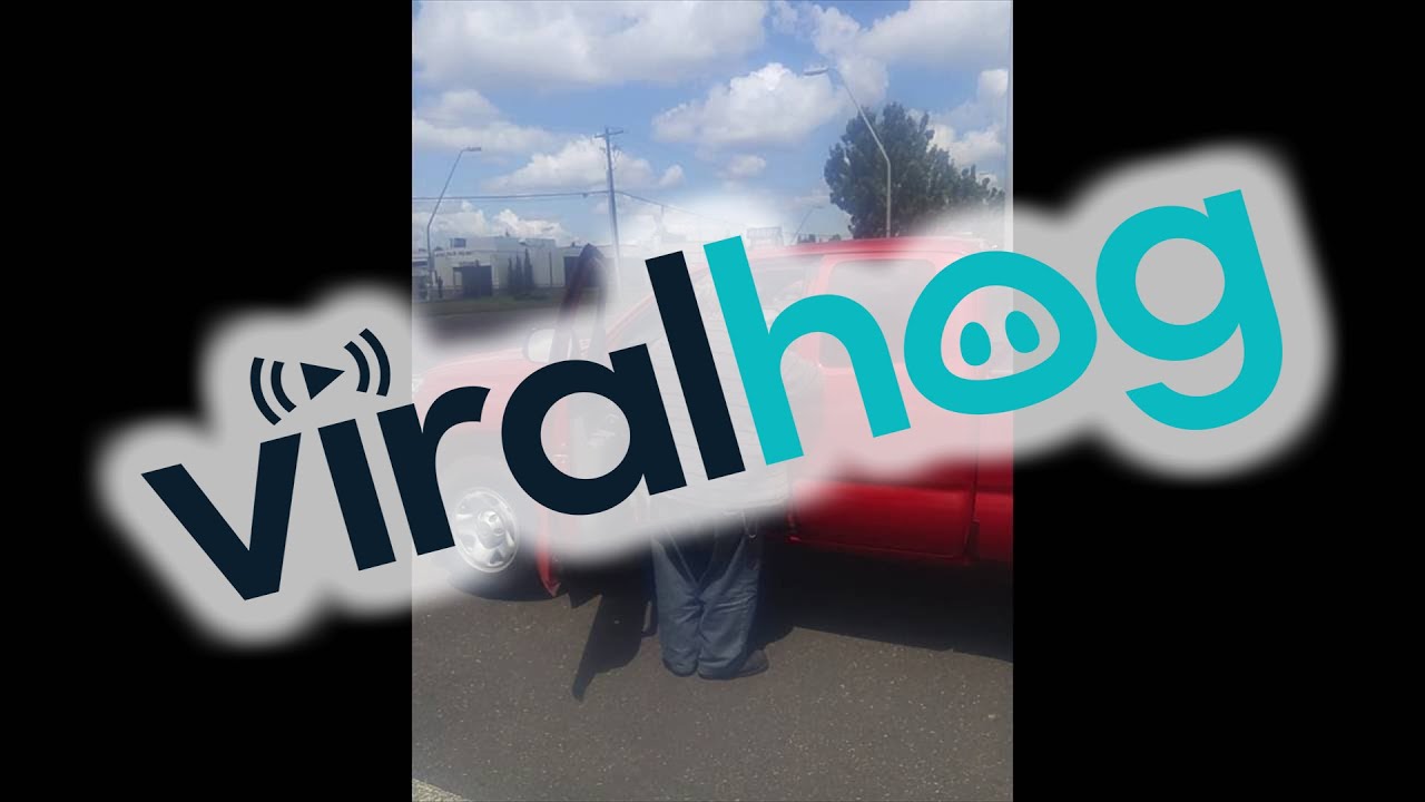 Man Sitting in Front of a Church Begging for Money with a Sign || ViralHog