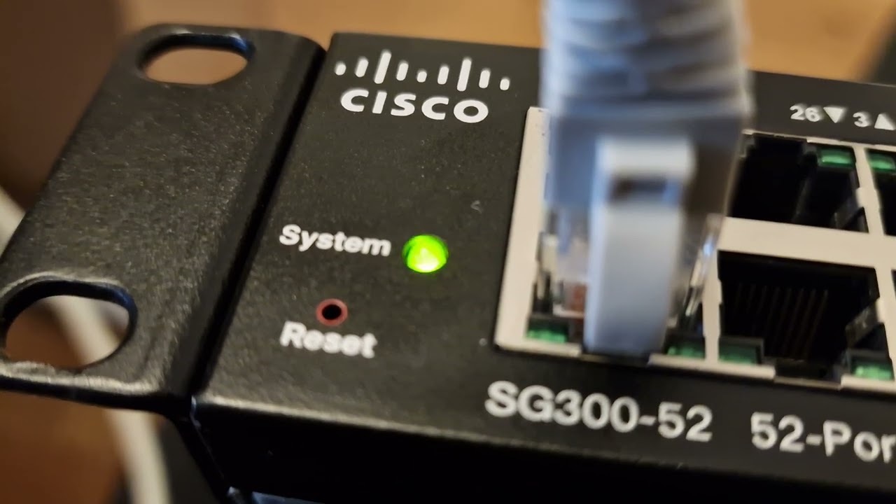 System LED on  Cisco SG300-52 Yellow Blinking