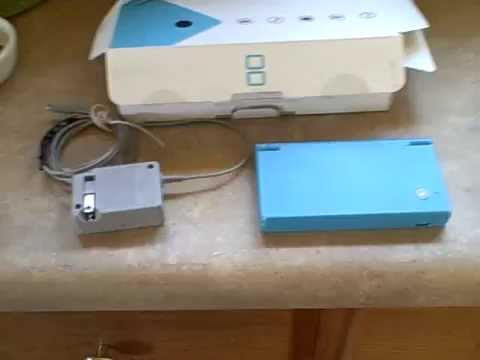 Nintendo DSi used Tested TWL-001 System Console Charger Original Box