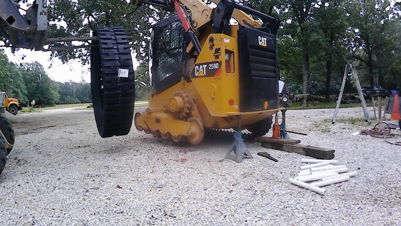 How to Change tracks on cat 259d