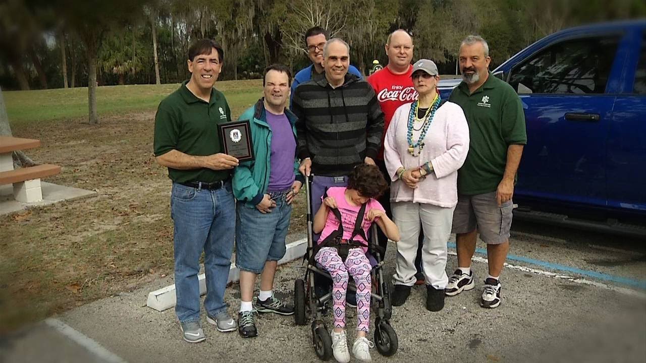 Adults with special needs volunteer for charity