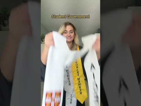 Girl is showing each core, stole, and medals that she received as graduation honors!