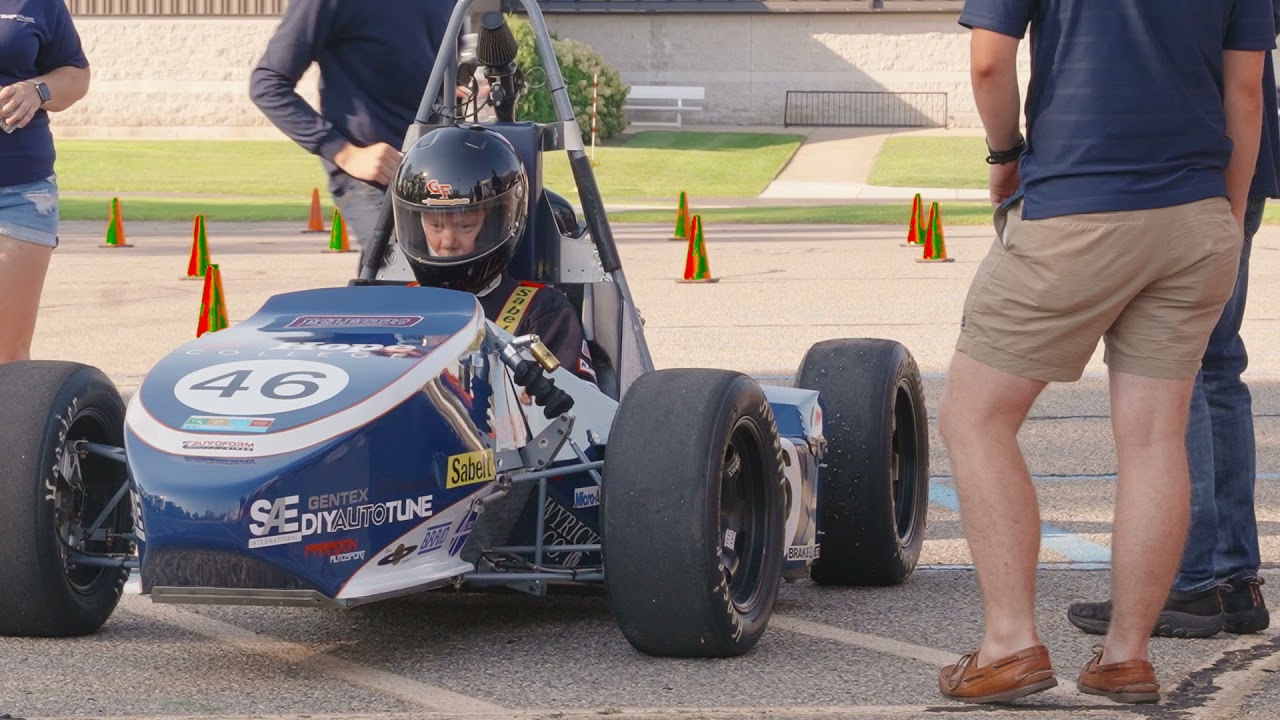 President Scogin test drives the Hope College Formula Race Car