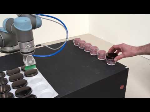 Lid placing with robot