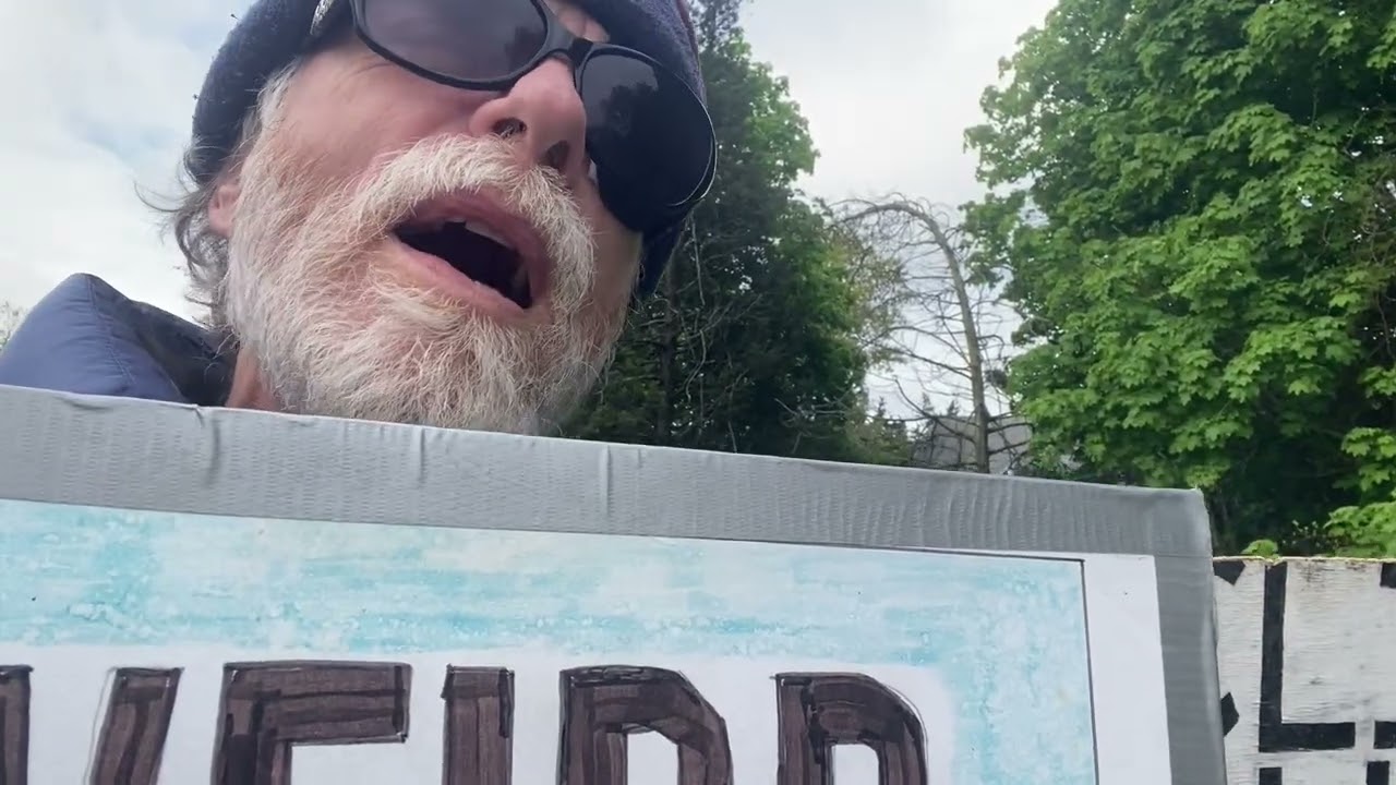 Man With Sign, May 15, 02026