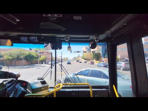 ABQ RIDE; Car driver turns on red and causes an accident w/ BRT Bus
