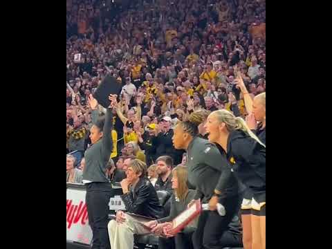 Caitlin Clark hits the shot to break the NCAA scoring record and the crowd takes it all in!