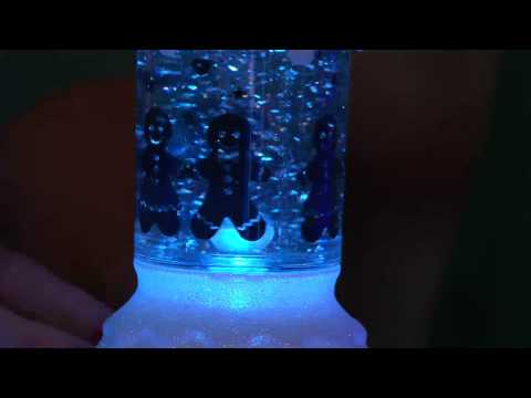 Mr. Christmas Flameless Color Morphing Spinning Glitter Candle with Kerstin Lindquist