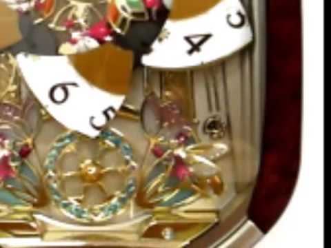 QXM157BRH - Seiko Melodies in Motion Petals & Pixies Animated Wall Clock