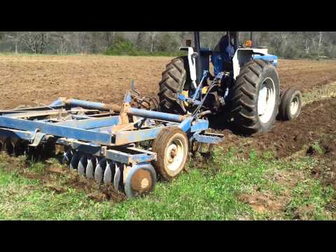 Ford 6610 disking plowing