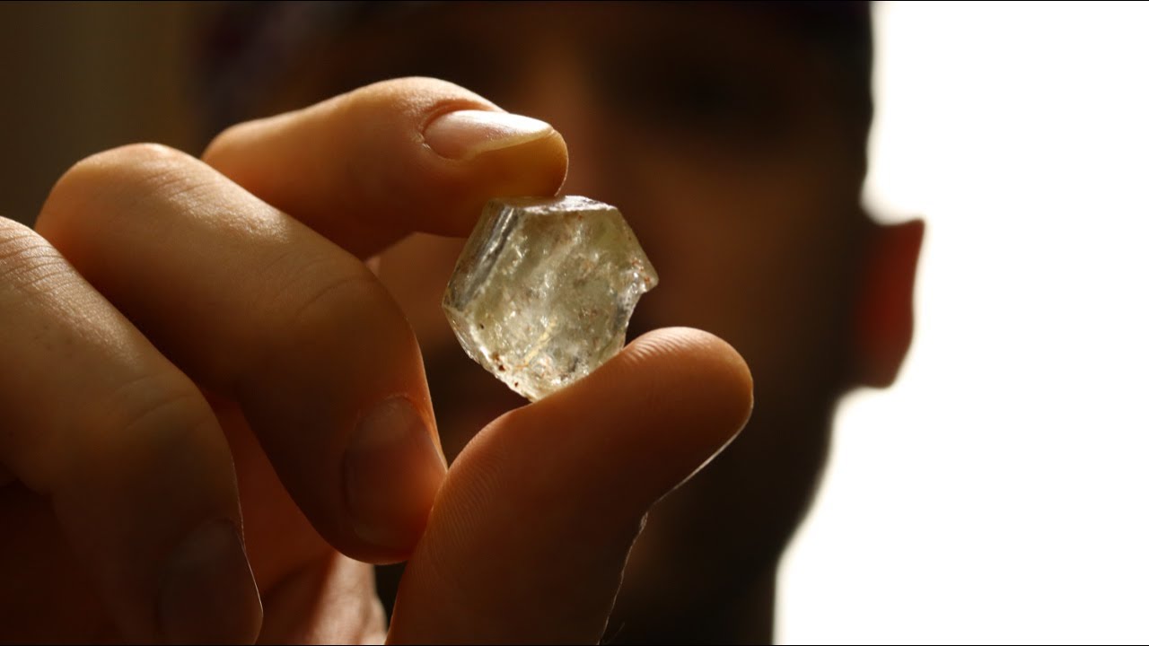 A Schmuck Cuts a Massive Beryl Crystal