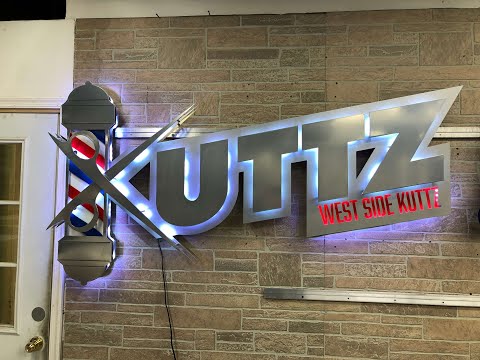 Custom metal business signage - Kuttz Barber Shop