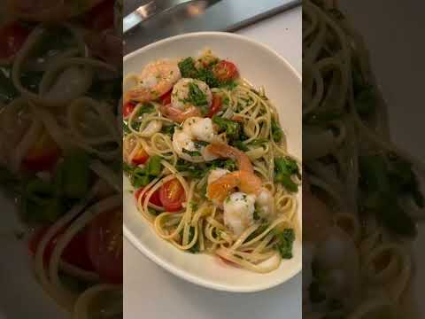 Garlic shrimp scampi with linguine broccolini and cherry tomatoes