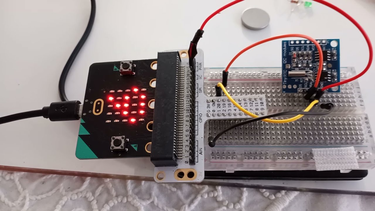 1307 RTC with Microbit. Simple clock code in description. Extension Included.