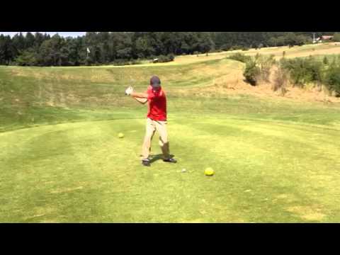 Unknown player smashes 3 wood at Bella Vista Golf Course