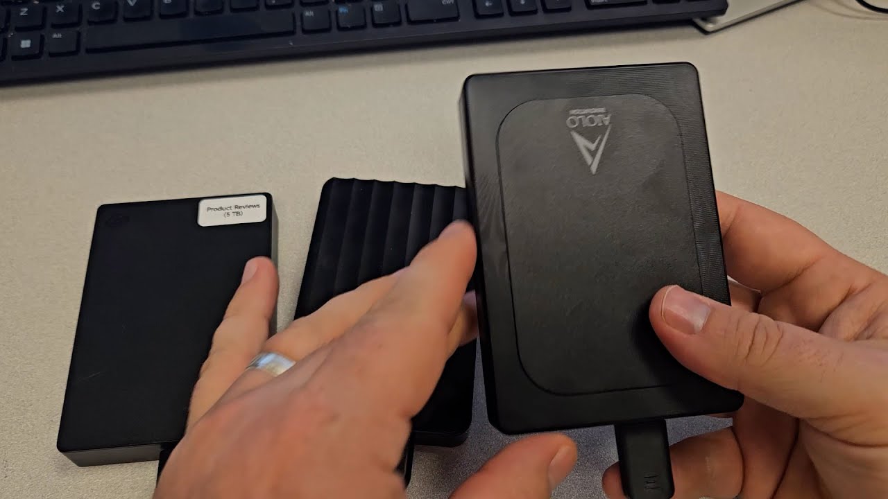 Comparison of Aiolo Innovation, Yotuo, and Seagate portable external hard drives