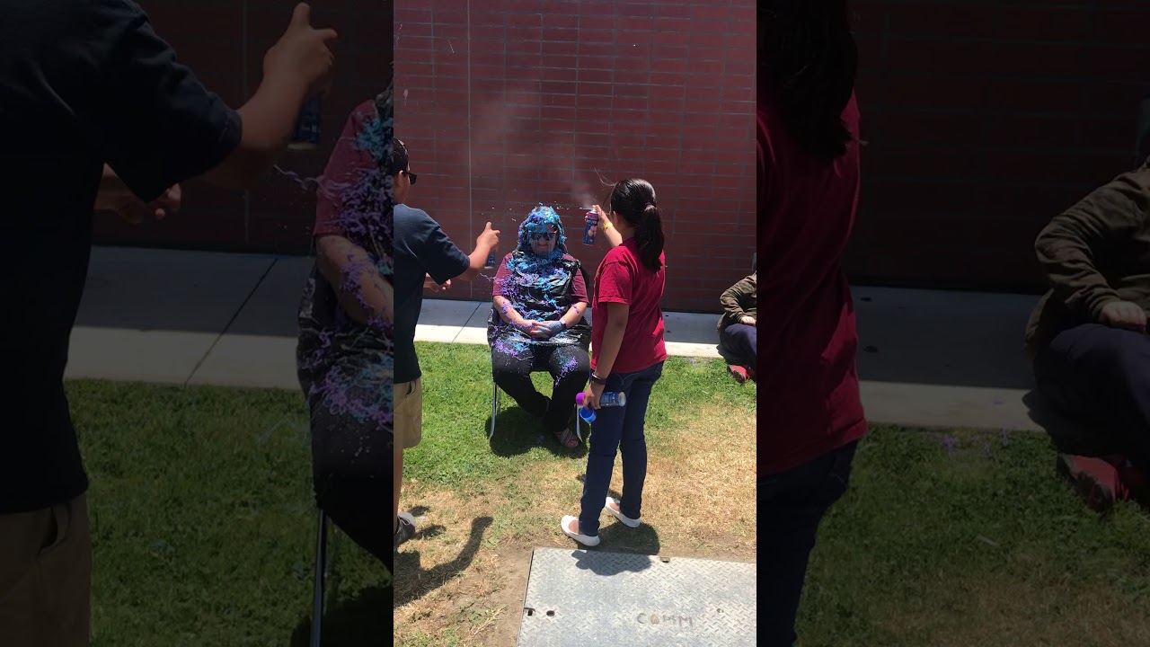 mrs hepps getting sprayed with silly string