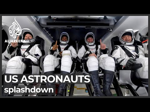 ISS astronauts splash down on SpaceX craft