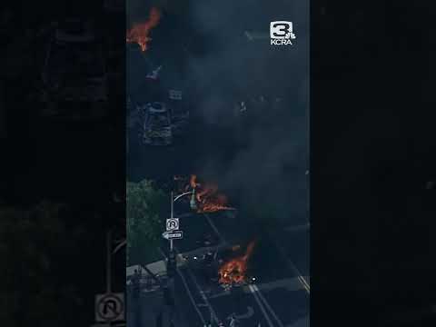 Protesters set driverless vehicles on fire in Los Angeles amid clash with National Guard