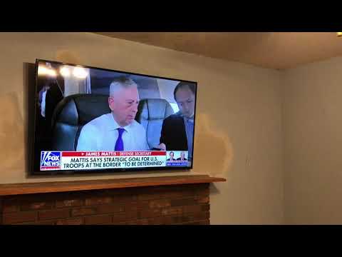 TV mounted over Fireplace with Xfinity