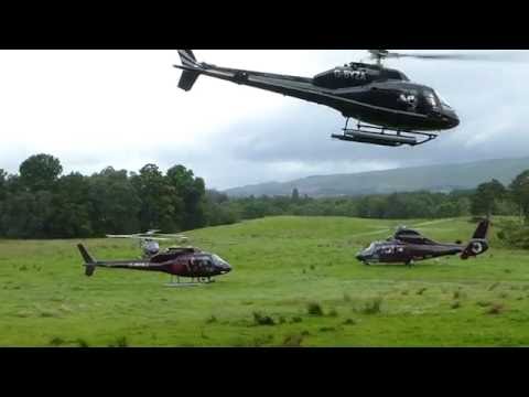 A FLEET OF PDG HELICOPTERS DEPART INVERLOCHY CASTLE HOTEL.