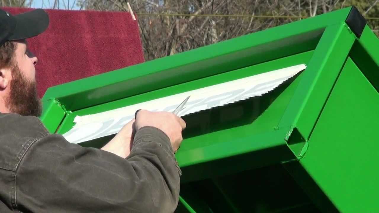 Laying the deere decals
