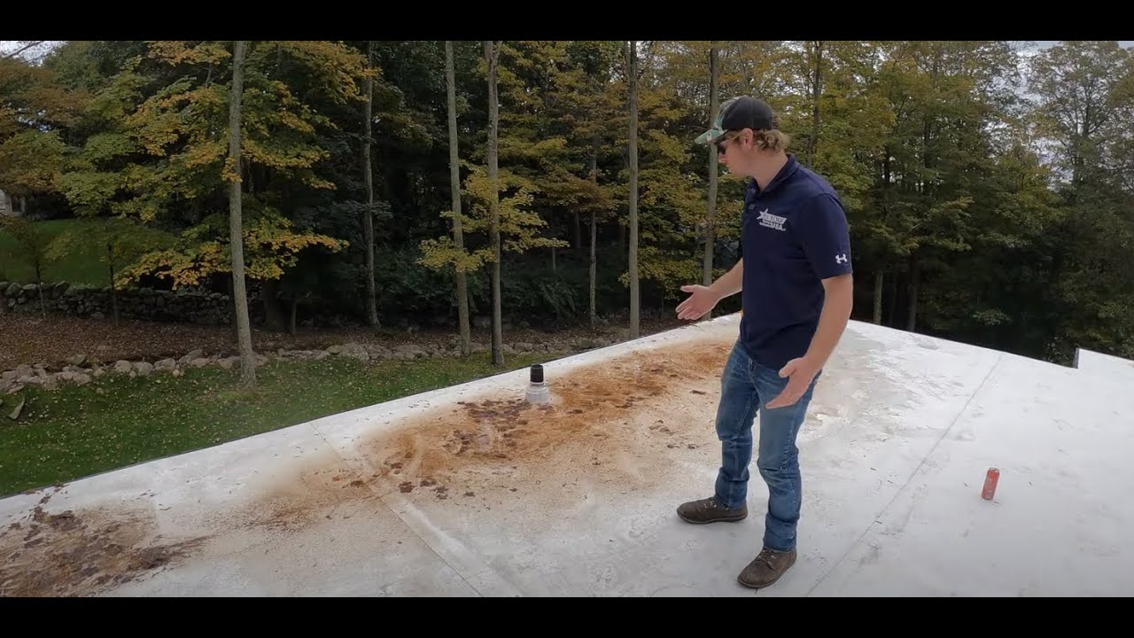 How to remove standing water on a flat roof
