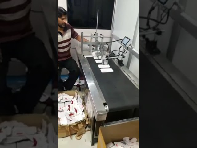 Automatic Conveyor Feeder Machine - High speed carton feeder with coder ...