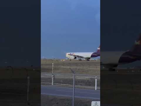 FedEx Cargo Airplane in Flight, Delivering packages across the globe with speed & efficiency. #FedEx