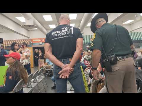 Monica Gets Arrested For Wearing A Red 1776 Shirt