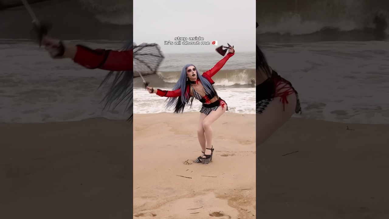 Drag queen falls at the beach in platform heels *dangerous*