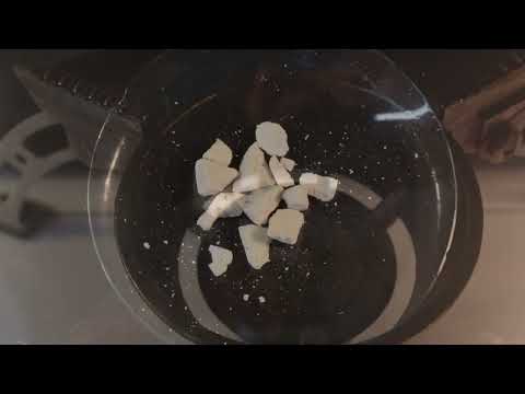 CaCO3 thermal decomposition; reaction of CaO with H2O; testing Ca(OH)2 formed with phenolphthalein