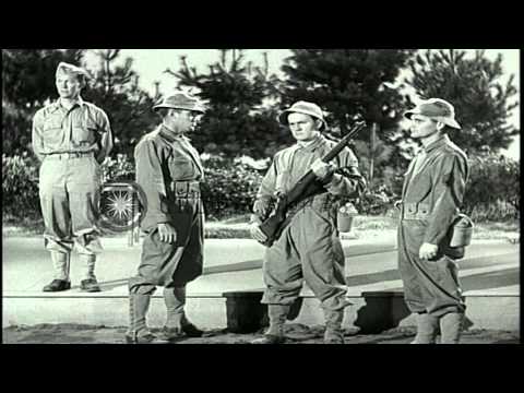 A US Army training film on Rifle Marksmanship with an M-1 for various firing posi...HD Stock Footage