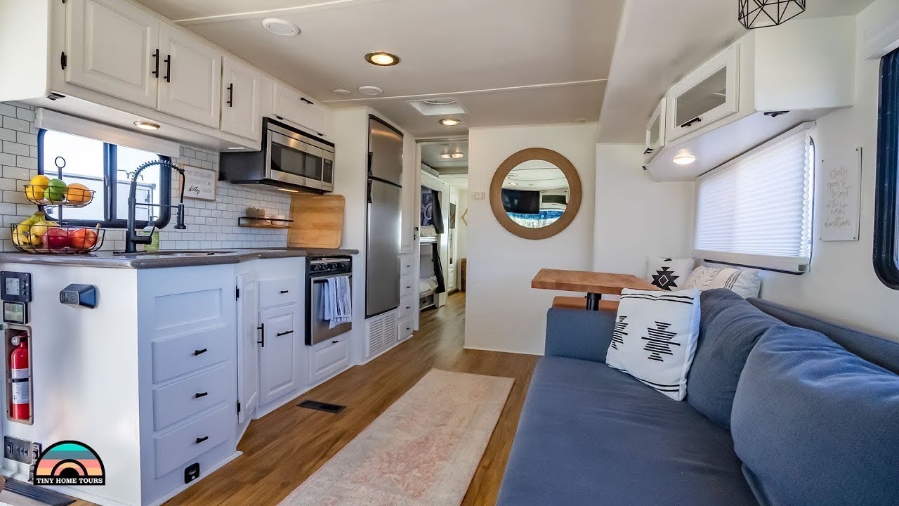This Class A Motorhome Has a Homey Design With Two Sleeping Areas and a ...
