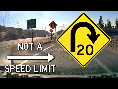 What does a YELLOW road sign mean?
